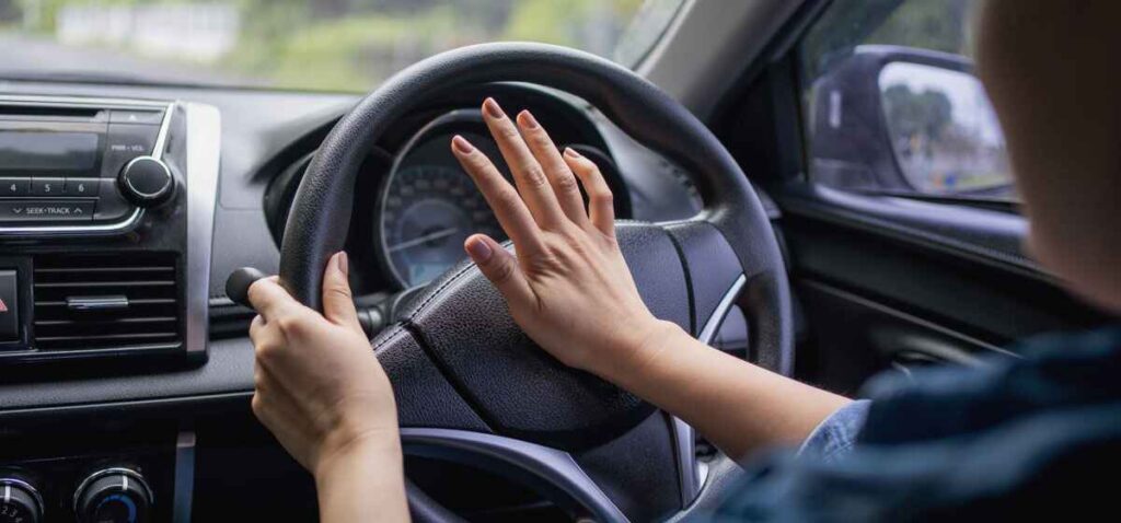 Why Does My Car Squeak When I Reverse? 9 Causes & Easy Fixes